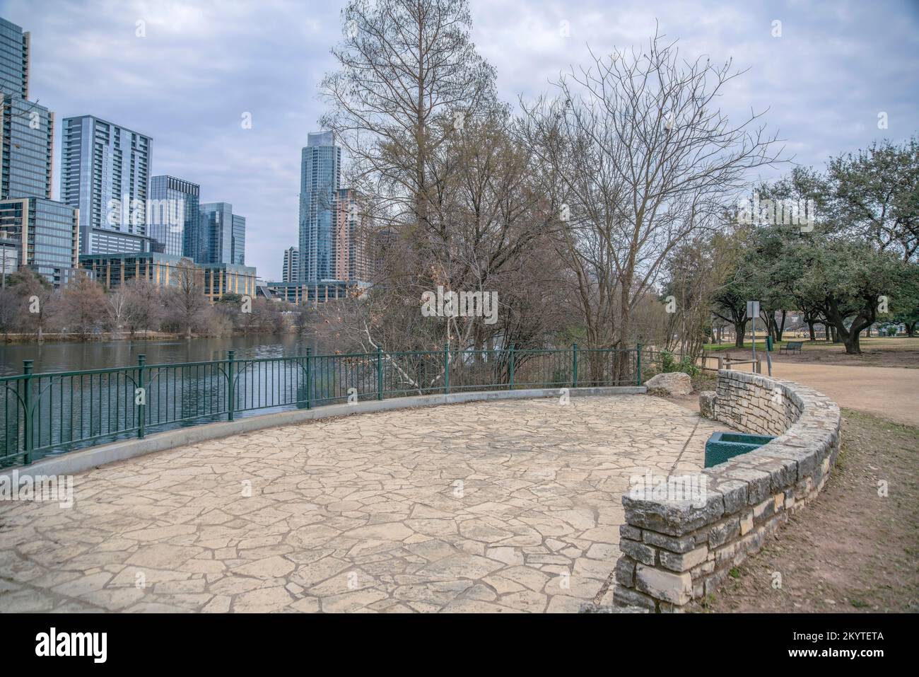 Colorado River and skyscraper buildings views from Butler Metro Park- Austin, Texas. View deck ...
