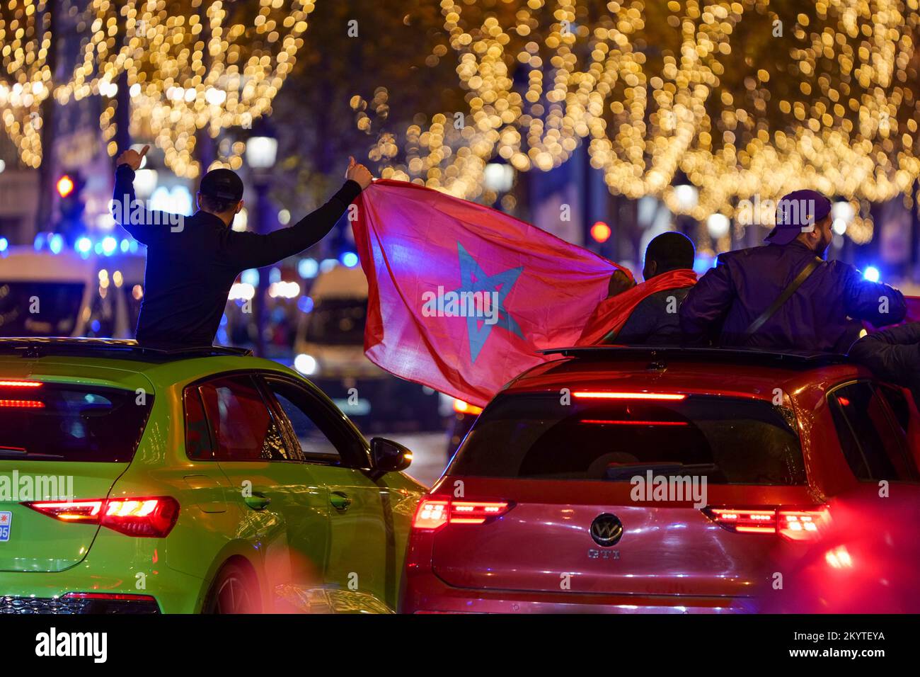 Paris, France, 01/12/2022. Moroccan and Tunisian supporters celebrate ...