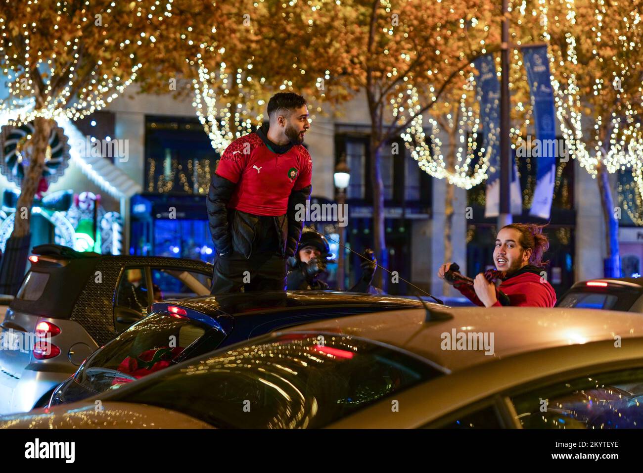 Paris, France, 01/12/2022. Moroccan and Tunisian supporters celebrate ...