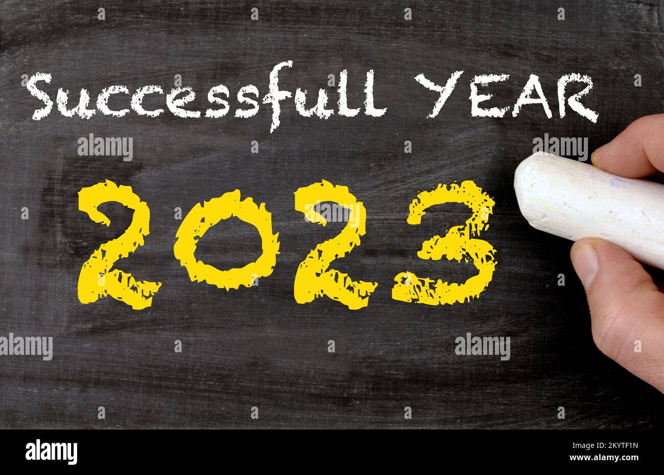 successfull year 2023 hand writing on blackboard Stock Photo - Alamy