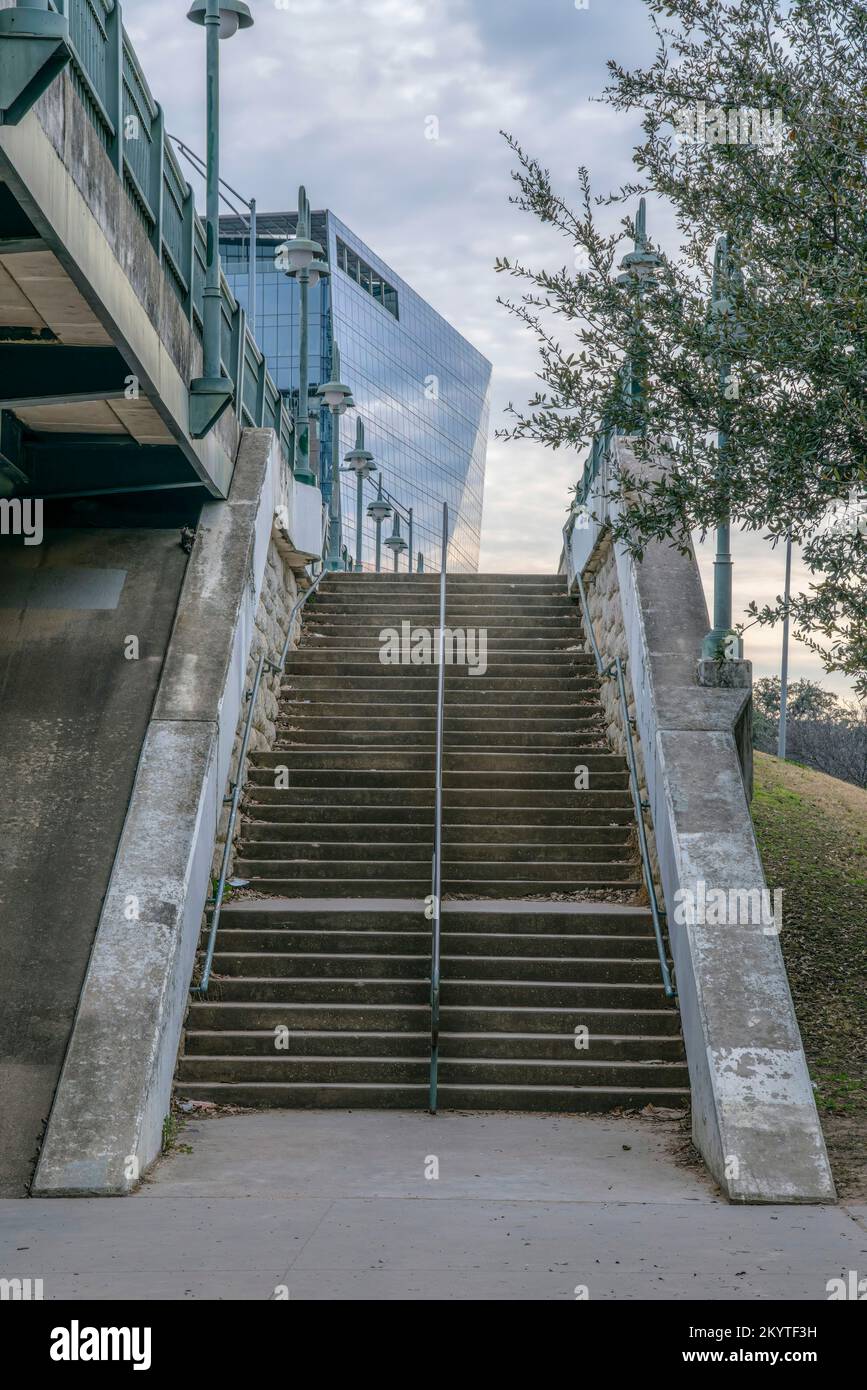 Austin, Texas- Wide outdoor concrete staircase with handrails in the ...