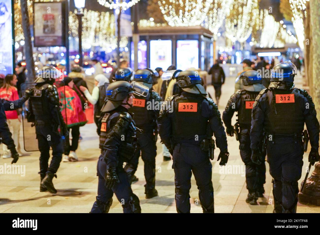 Paris, France, 01/12/2022. Moroccan and Tunisian supporters celebrate ...