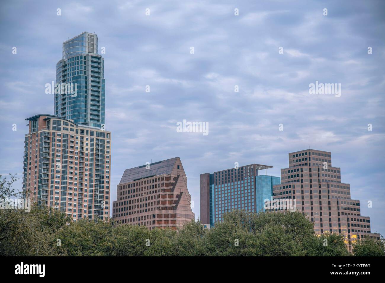 Cityscape above the trees views from Butler Metro Park- Austin, Texas ...