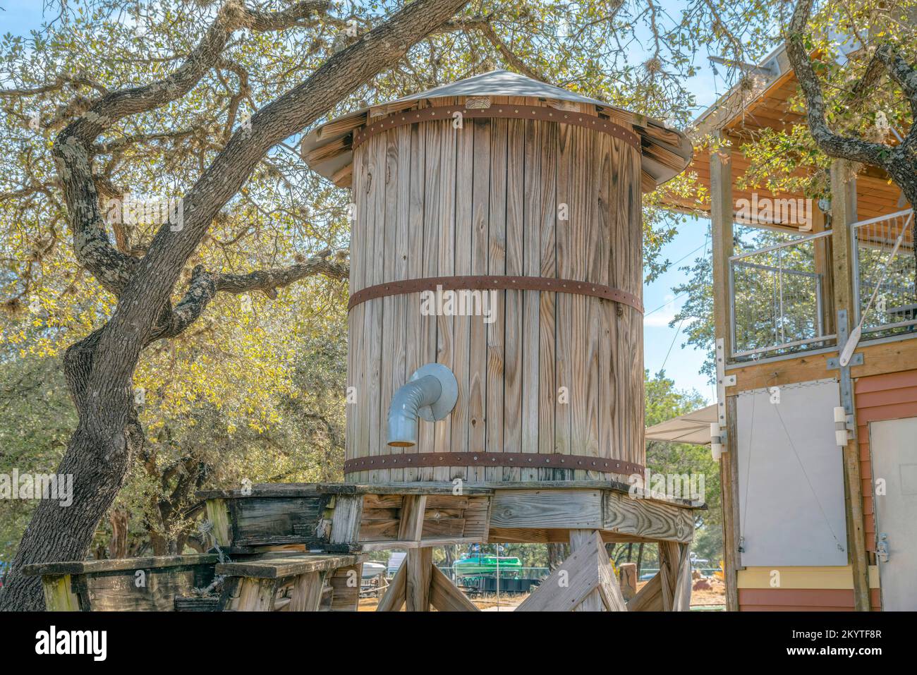 Timber water tank near Lake Austin in Austin, Texas. Wooden water tank ...