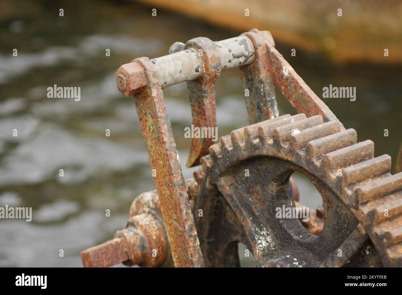 Rusty cog on a wier Stock Photo - Alamy
