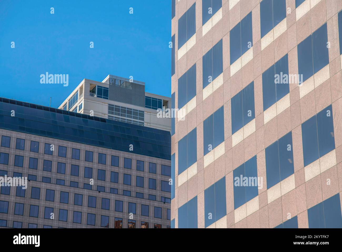 Austin, Texas- Buildings with brown marble wall claddings and tinted ...