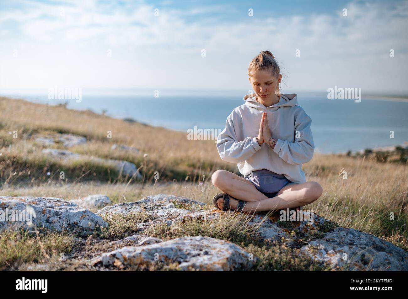 Girl practice yoga meditation outdoor in park Stock Photo - Alamy