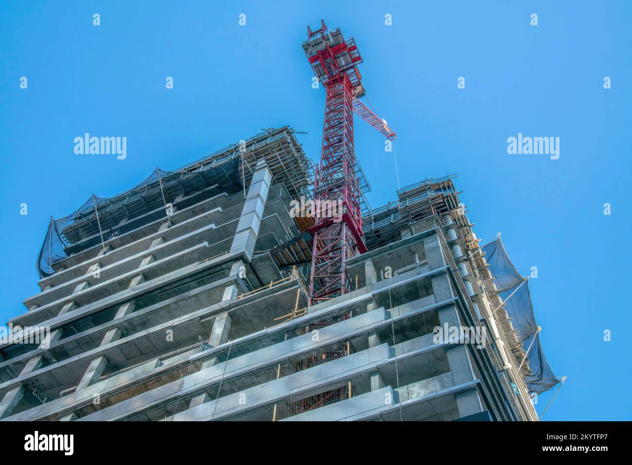 Austin, Texas- Under construction building with safety nets and tower ...