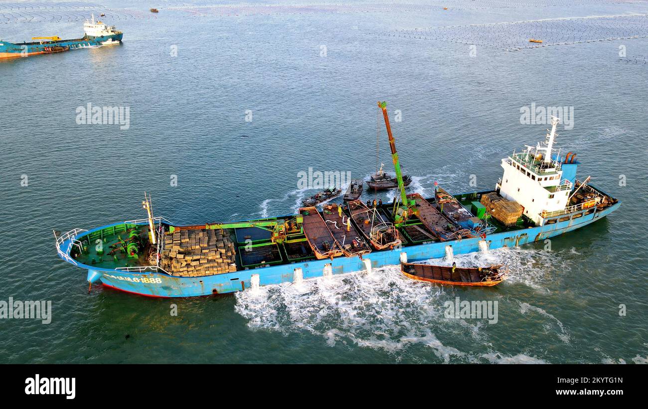 The busy scene in abalone area of a marine ranching in Rongcheng City ...