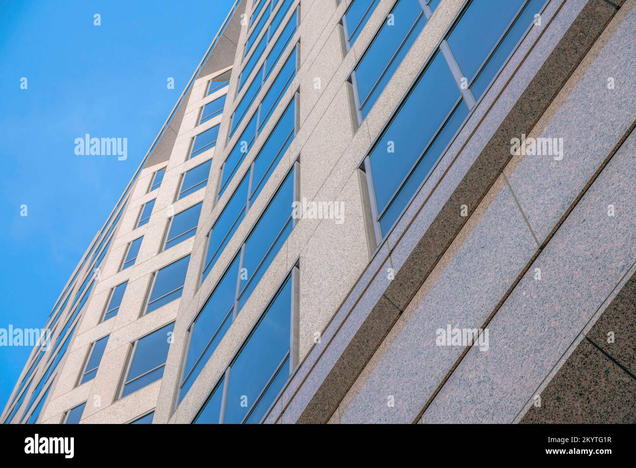Austin, Texas- Low angle view of a building with granite wall cladding ...