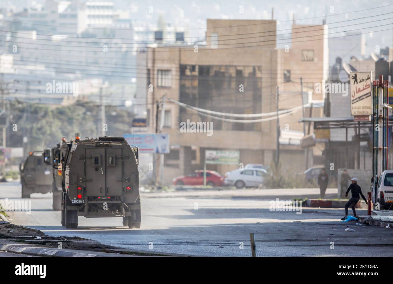 Nablus, Palestine - 02 Dec 2022, Palestinian youths throw stones at the ...