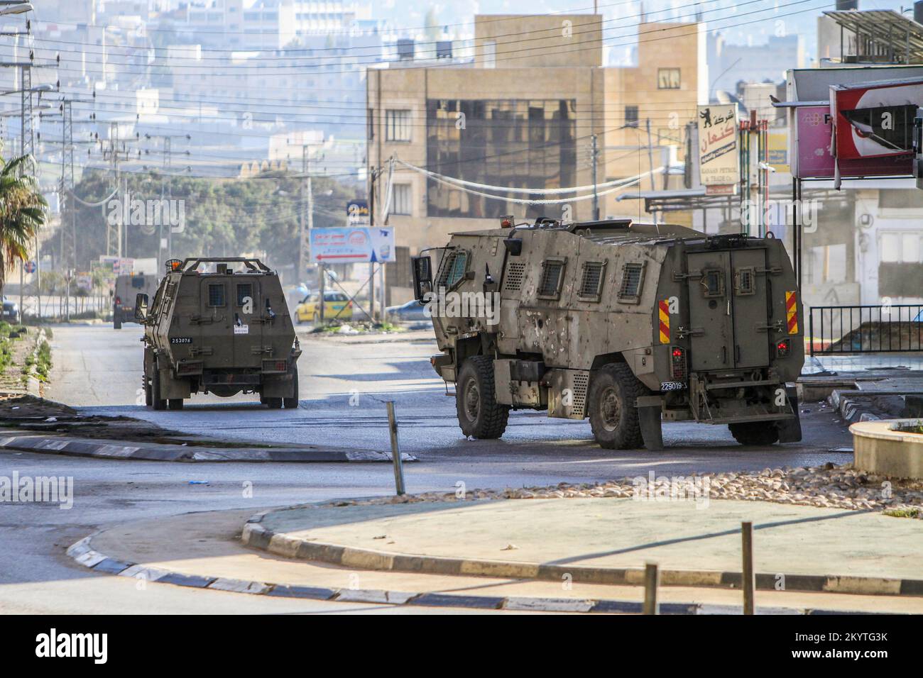 Nablus, Palestine - 02 Dec 2022, Israeli army vehicles seen withdrawing after they arrested a ...