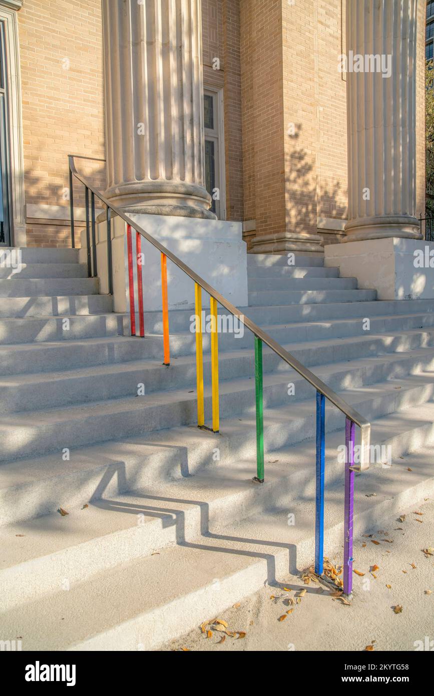 Austin, Texas- Wide stairs with floor-mounted handrails and painted ...