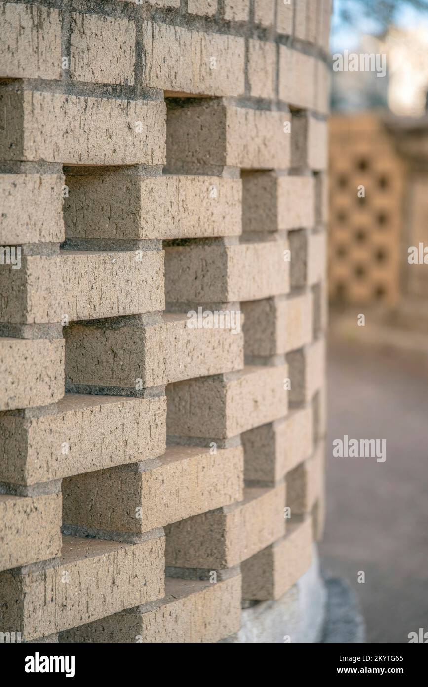 Austin, Texas- Selective focus curved wall structure with bricks. Close ...