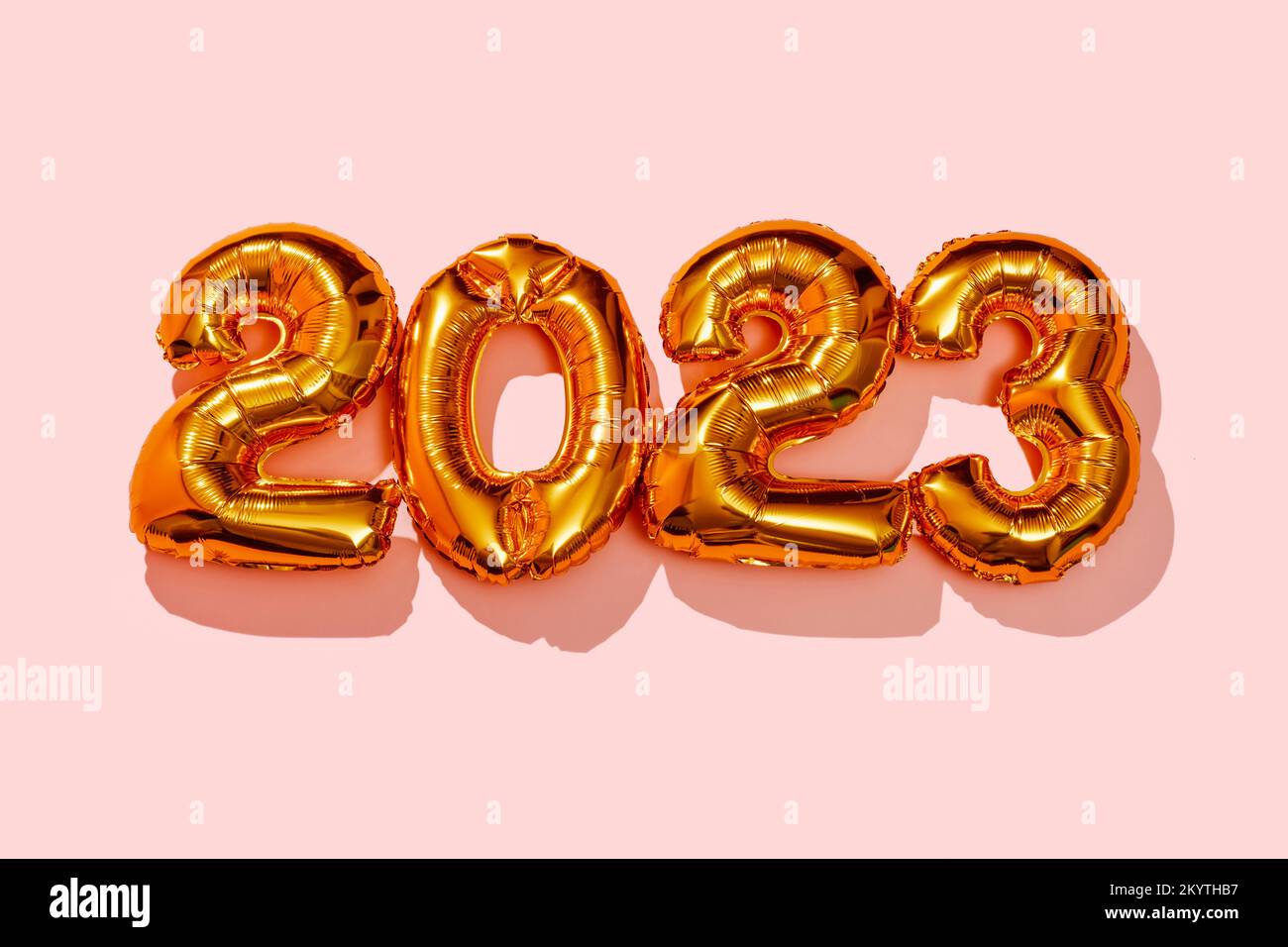 some golden number-shaped balloons forming the number 2023, as the new ...