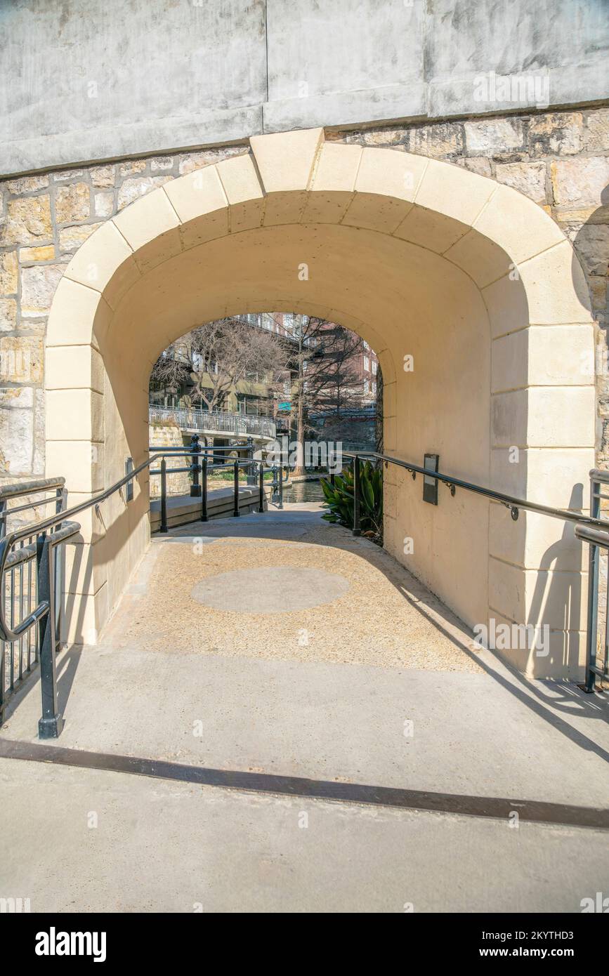Arched underpass below the bridge at River Walk, San Antonio, Texas ...