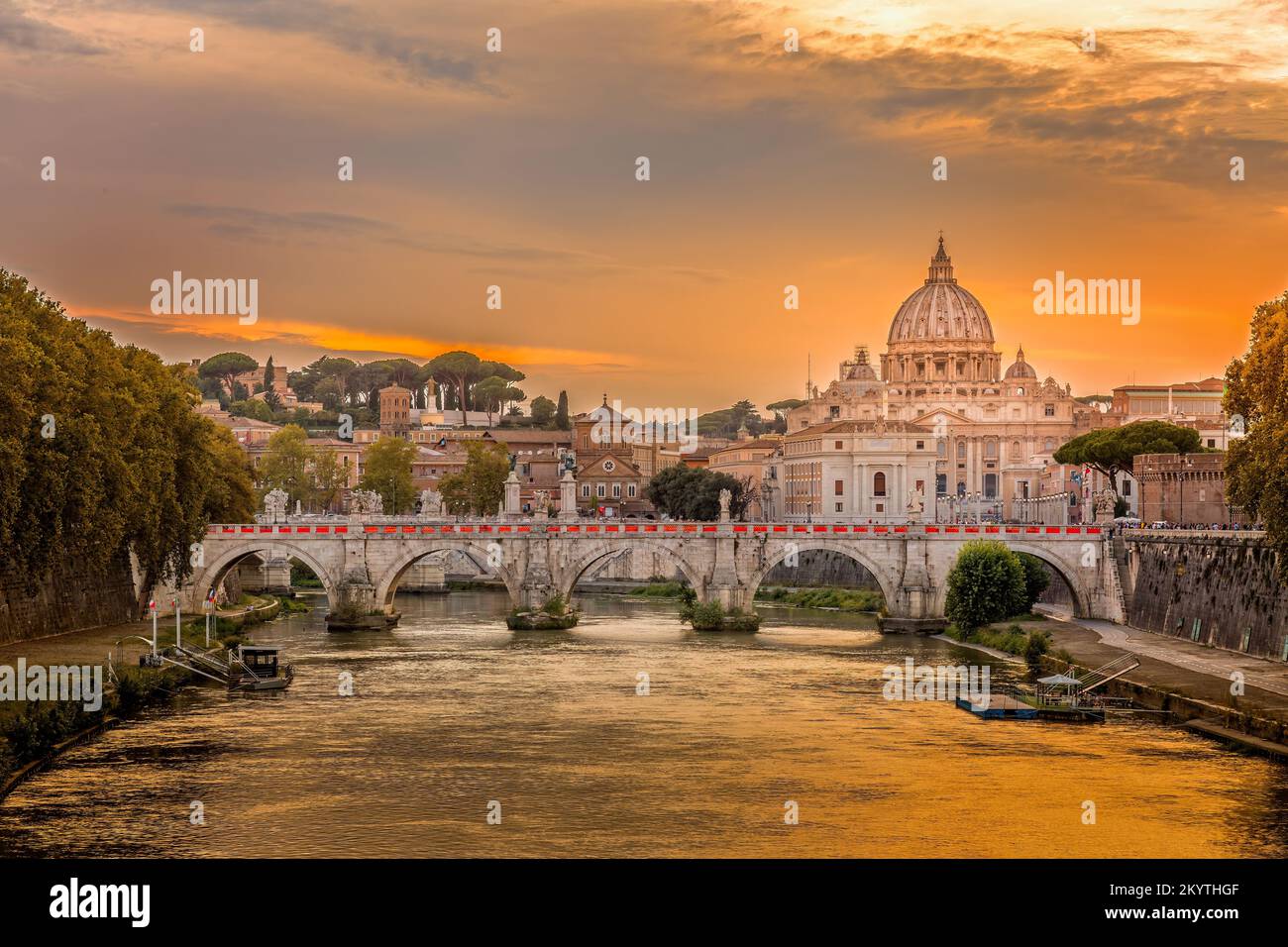 Saint Peter"s Basilica and the Santangelo bridge in the golden eveing ...