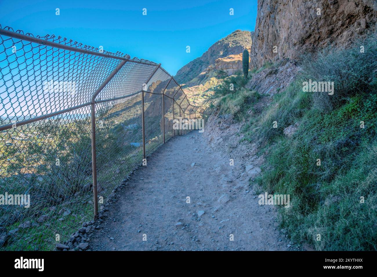 Camelback Mountain, Phoenix, Arizona- Hiking trail with chainlink fence ...
