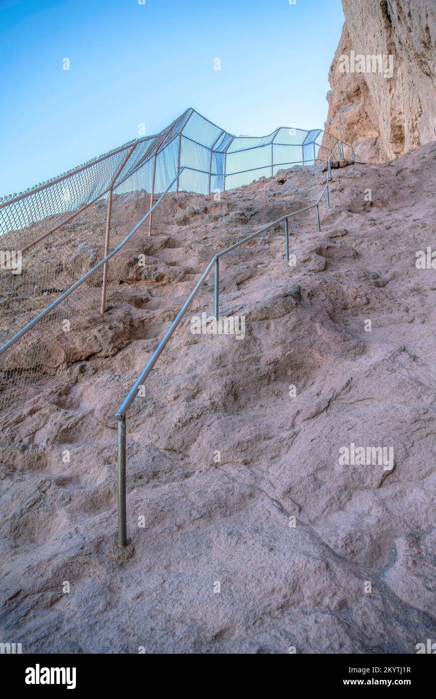 Phoenix, Arizona- Rocky hiking trail at Camelback Mountain with metal ...