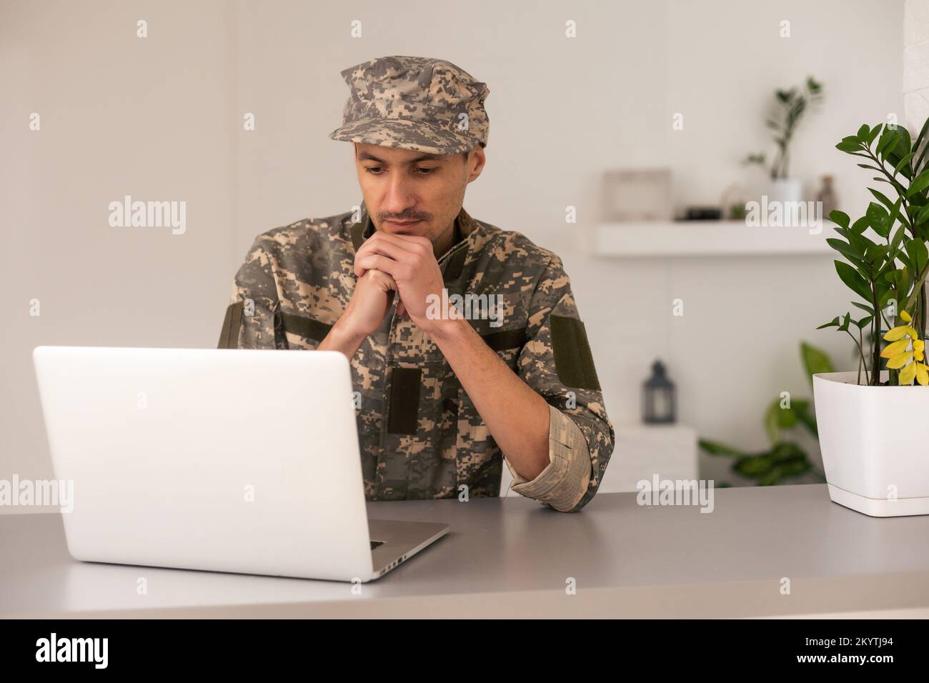 Young military soldier man portrait with laptop on background Stock ...