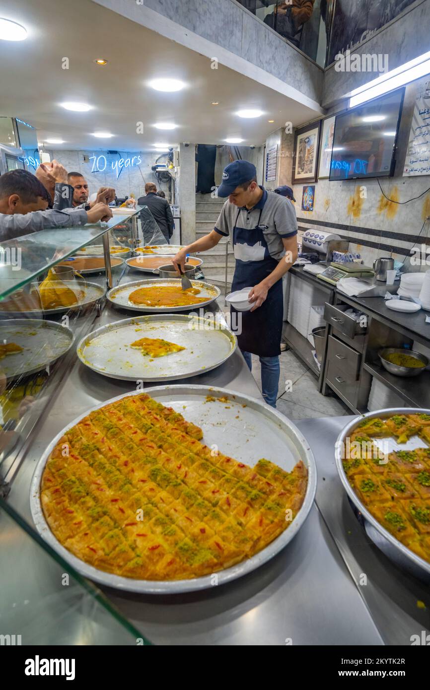 Shop selling Jordanian sweets in Amman Jordan Stock Photo - Alamy