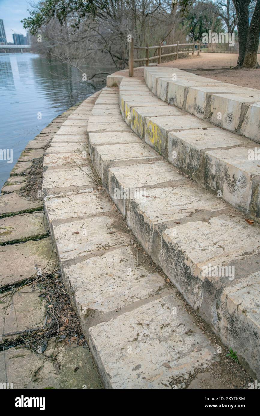 Concrete steps on the shore of Colorado River at Auditorium Shores Park ...