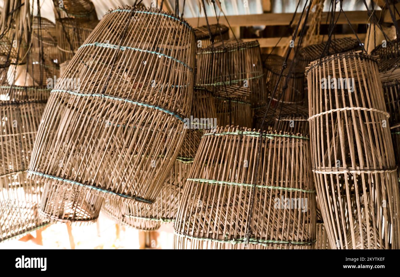 bamboo fishing trap made from bamboo wood isolated Stock Photo - Alamy