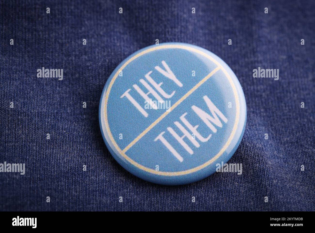 A person showing their They Them pronouns by wearing a badge Stock ...
