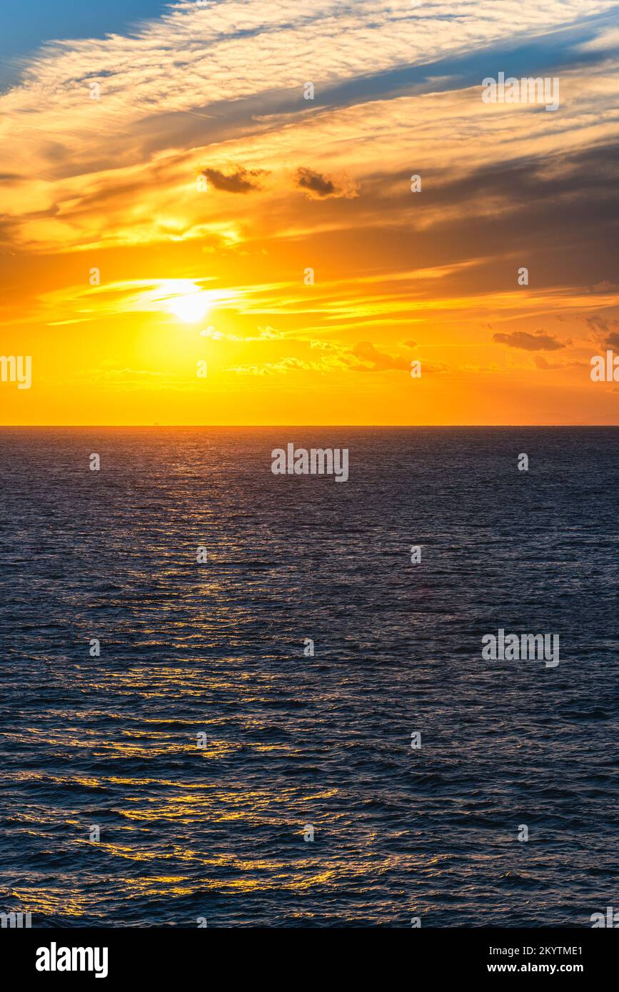 Cloudscape sunset reflection over sea hi-res stock photography and ...