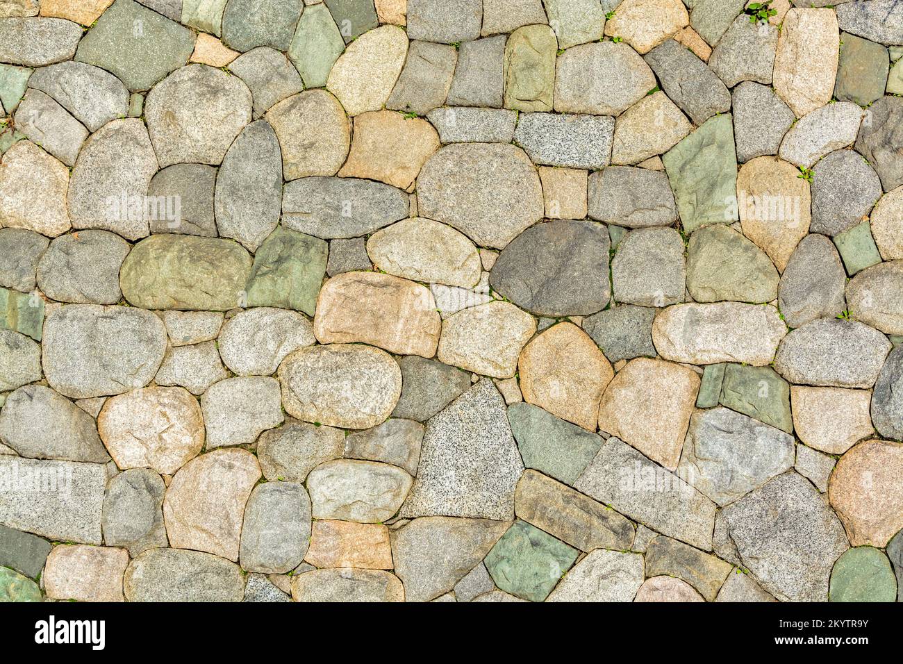 Wall built with natural stones. Natural rocks texture background Stock ...