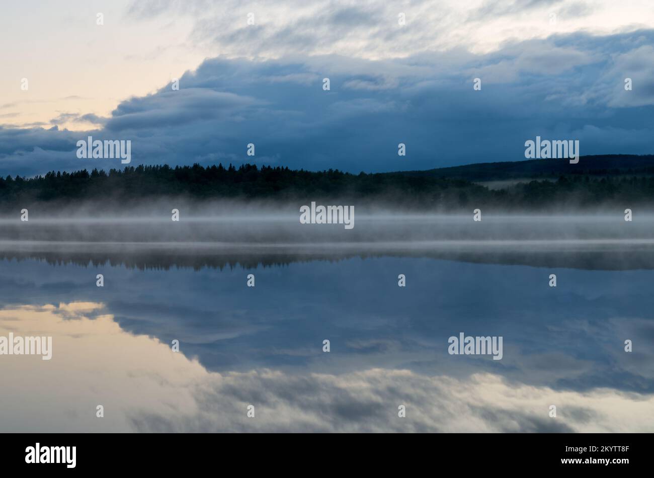 Summer river landscape with haze over the water Stock Photo - Alamy
