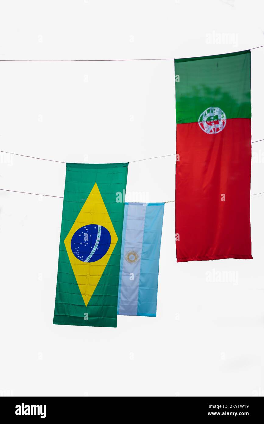 Brazilian, Canadian and Argentina flags are hanging on isolated white ...