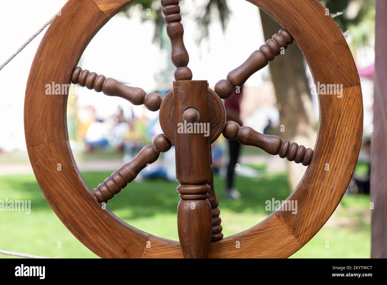 close up in horizontal view of the drive wheel and spokes of a pedal ...