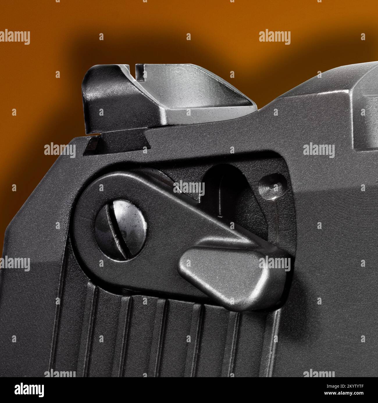 Rear sight and safety on a pistol with shadow behind Stock Photo - Alamy