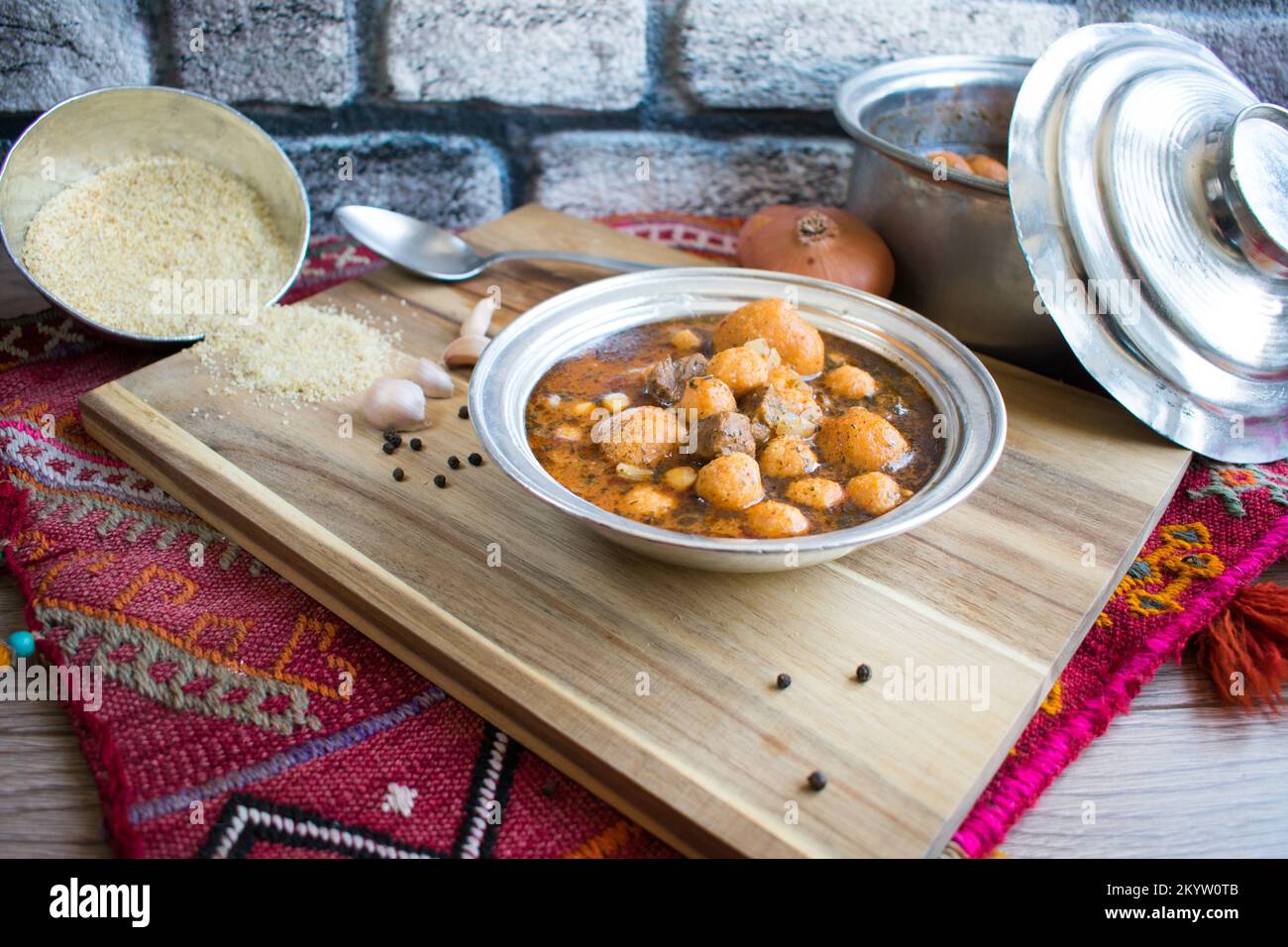 Traditional Turkish food; bulgur soup with minced meat "Anali Kizli ...