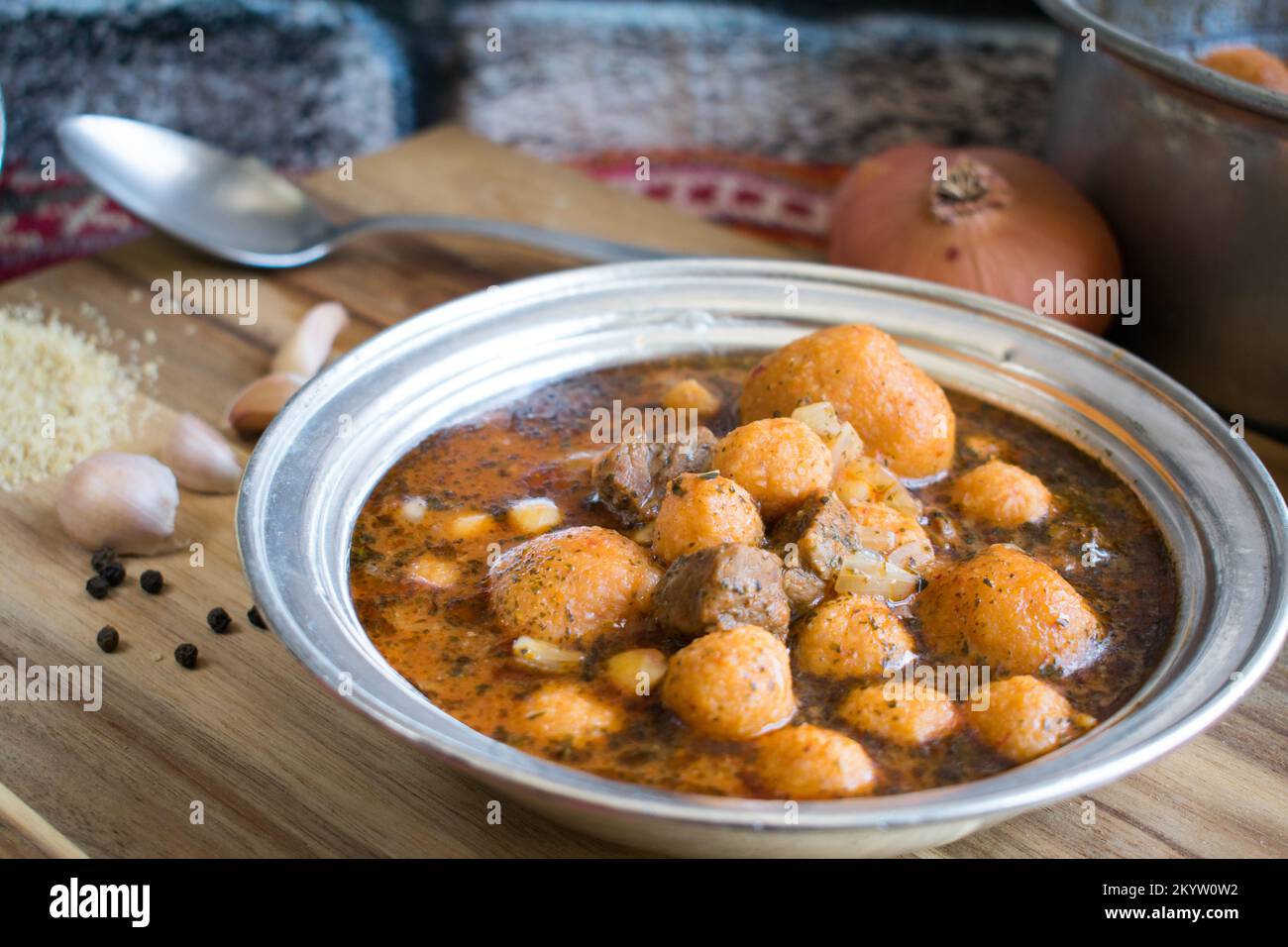 Traditional Turkish food; bulgur soup with minced meat "Anali Kizli ...