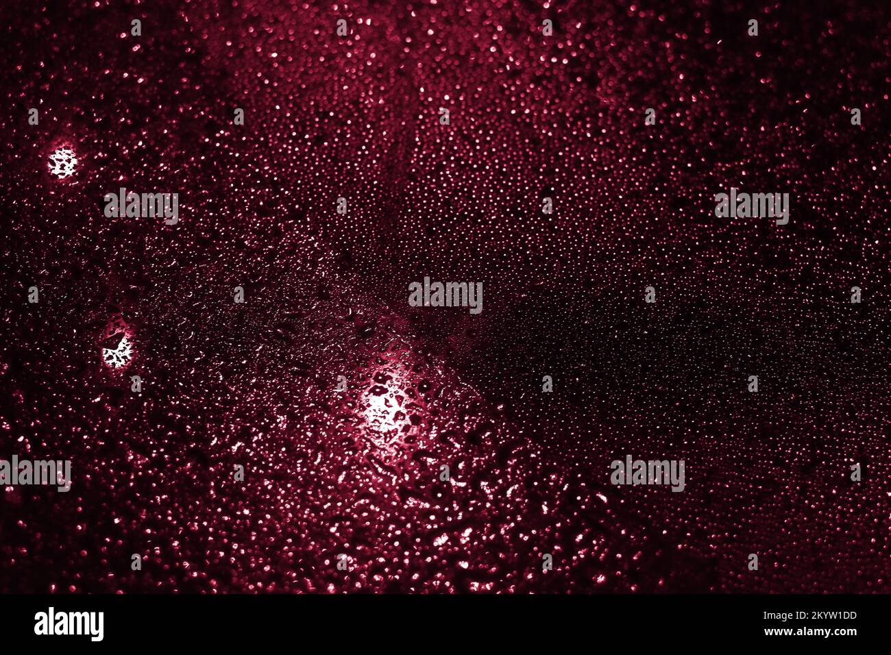 Viva Magenta toned Bokeh Street Lights At Night While Raining. On a ...