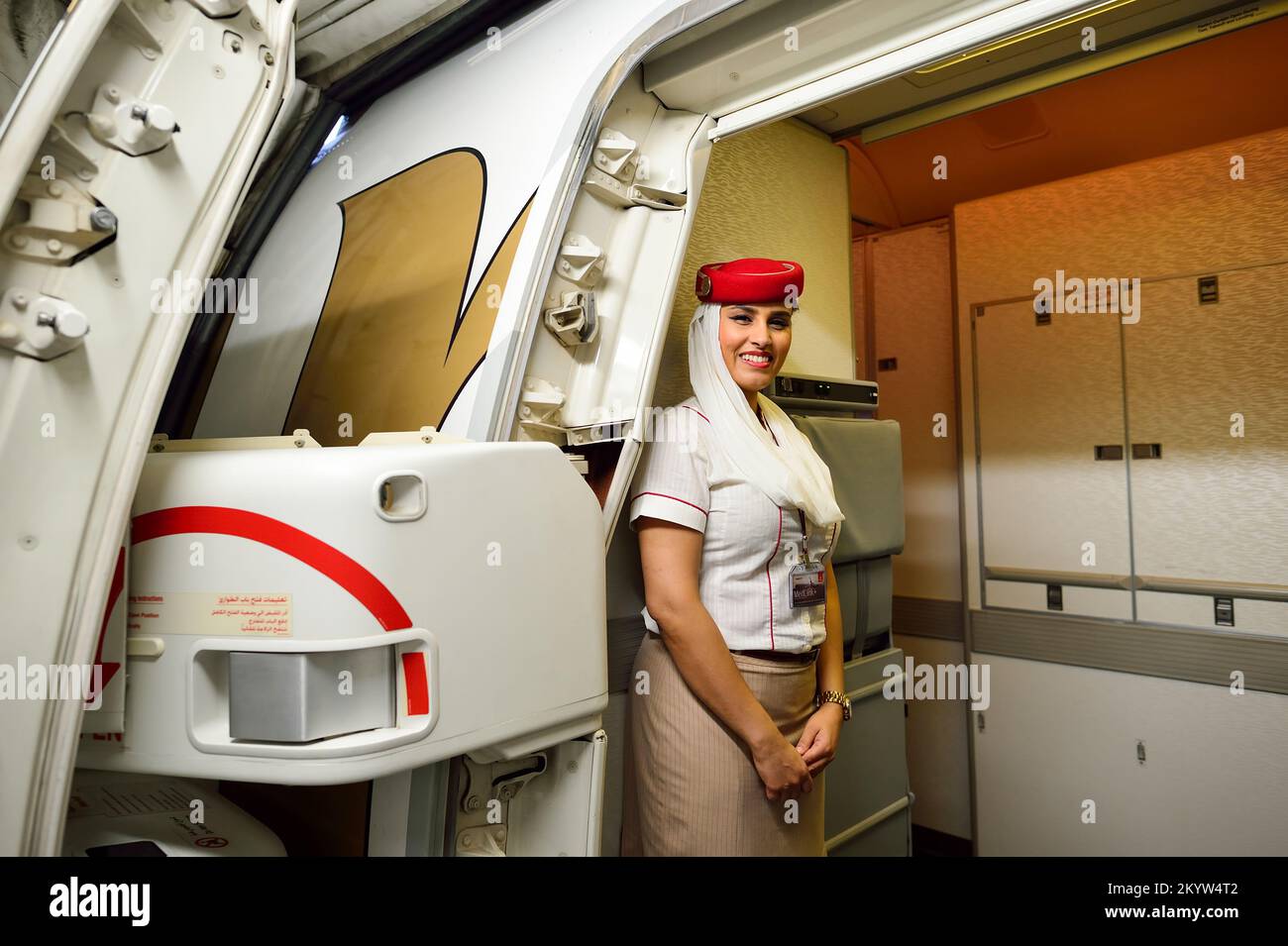 HONG KONG - NOVEMBER 16, 2015: Emirates crew member on board of Boeing ...
