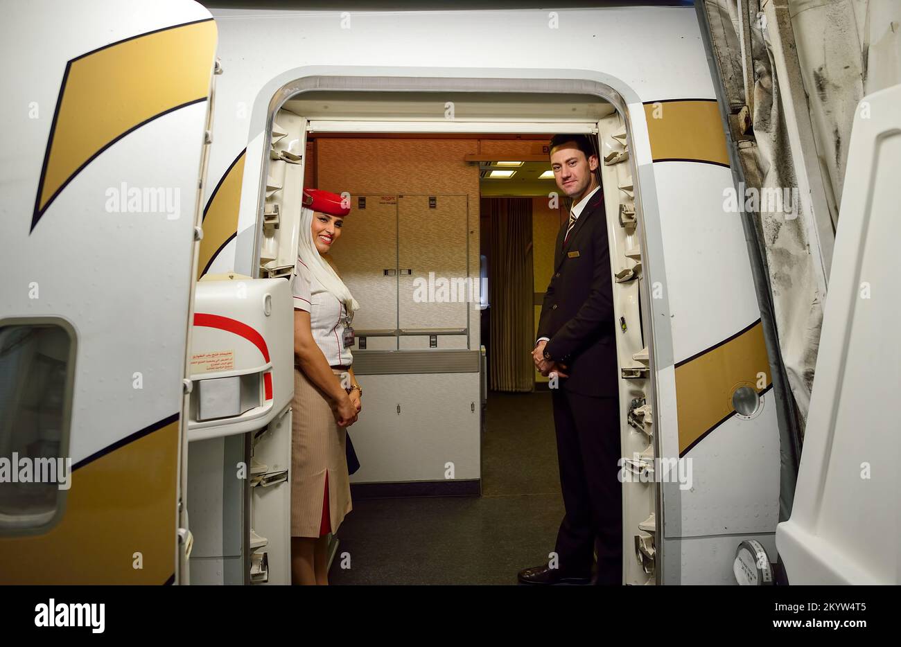 HONG KONG - NOVEMBER 16, 2015: Emirates crew members on board of Boeing ...