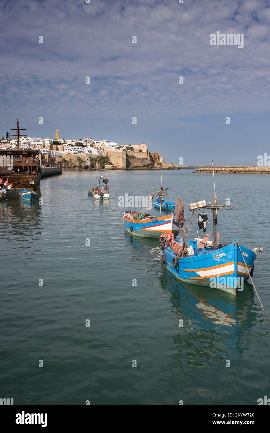 fishing boats moored in morocco's capital city rabat on the banks of ...