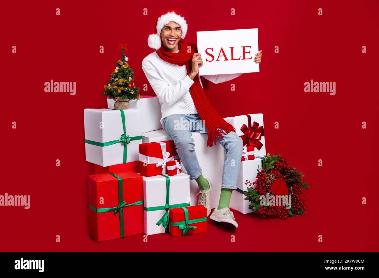 Photo of young funny laughing wear guy christmastime outfit hold paper ...