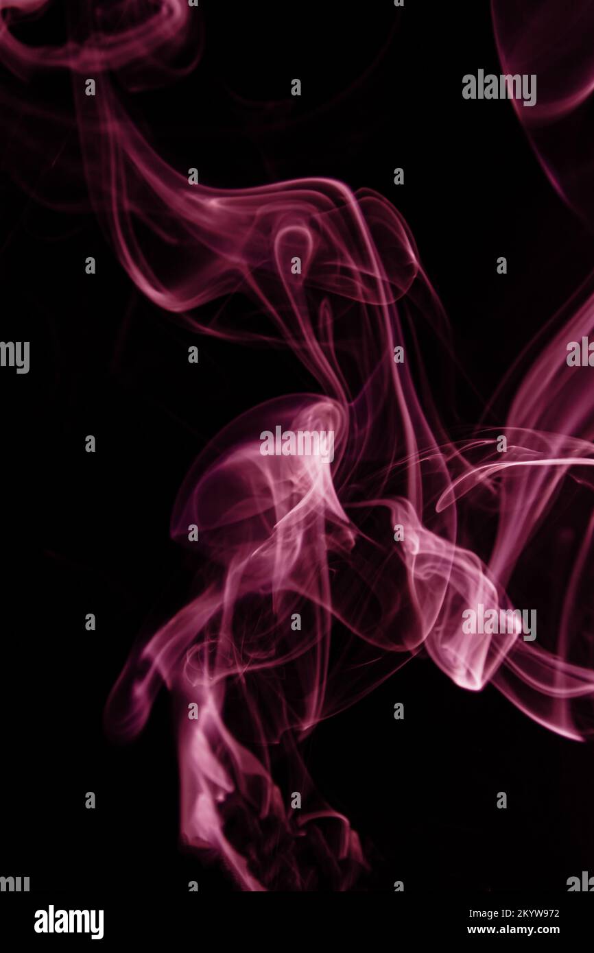 Magenta wisp of smoke on black background. Concept poster of color of ...