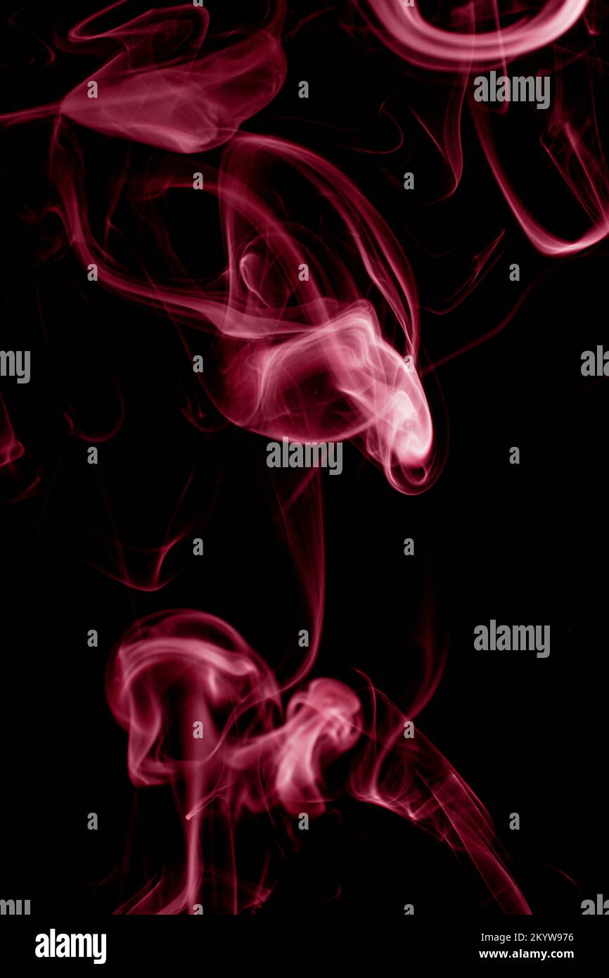 Magenta wisp of smoke on black background. Concept poster of color of ...
