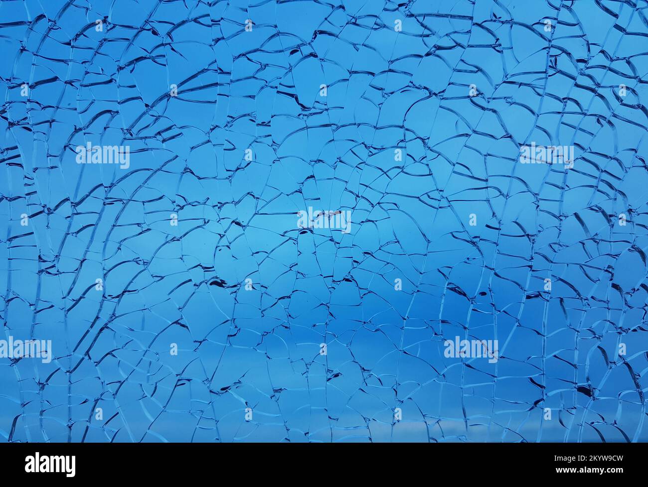 Abstract blue broken cracked glass window on sky background Stock Photo ...
