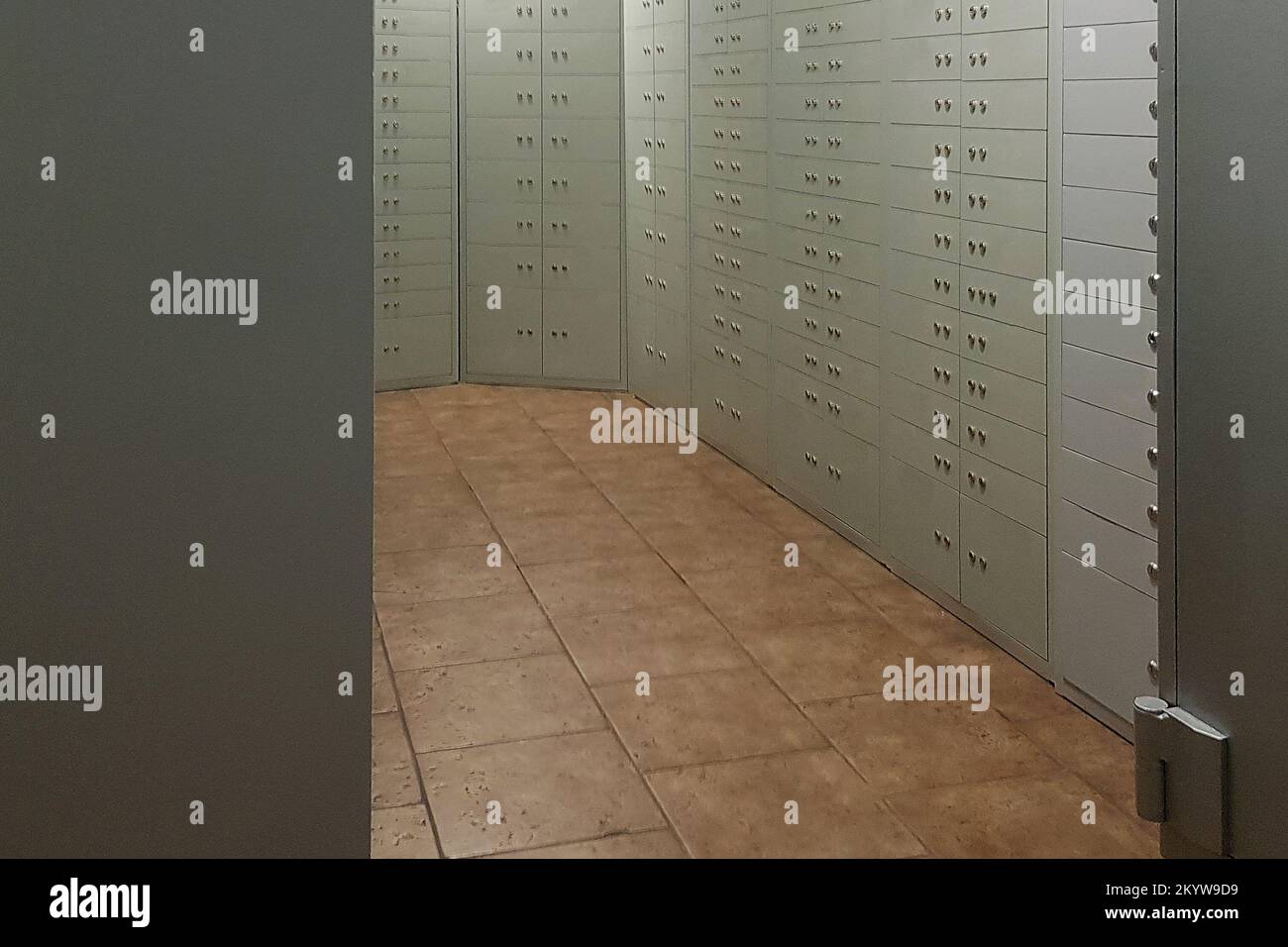 Storage with individual deposit grey cells boxes in the bank and brown ...