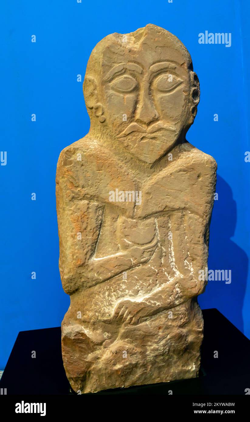 Stone statue with sculptured face. South Kazakhstan. 5th - 7th century ...