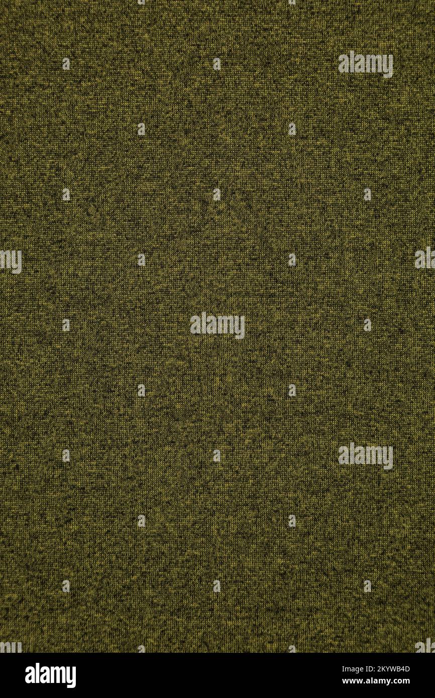 Texture of knitted fabric in green color. Light khaki background Stock ...