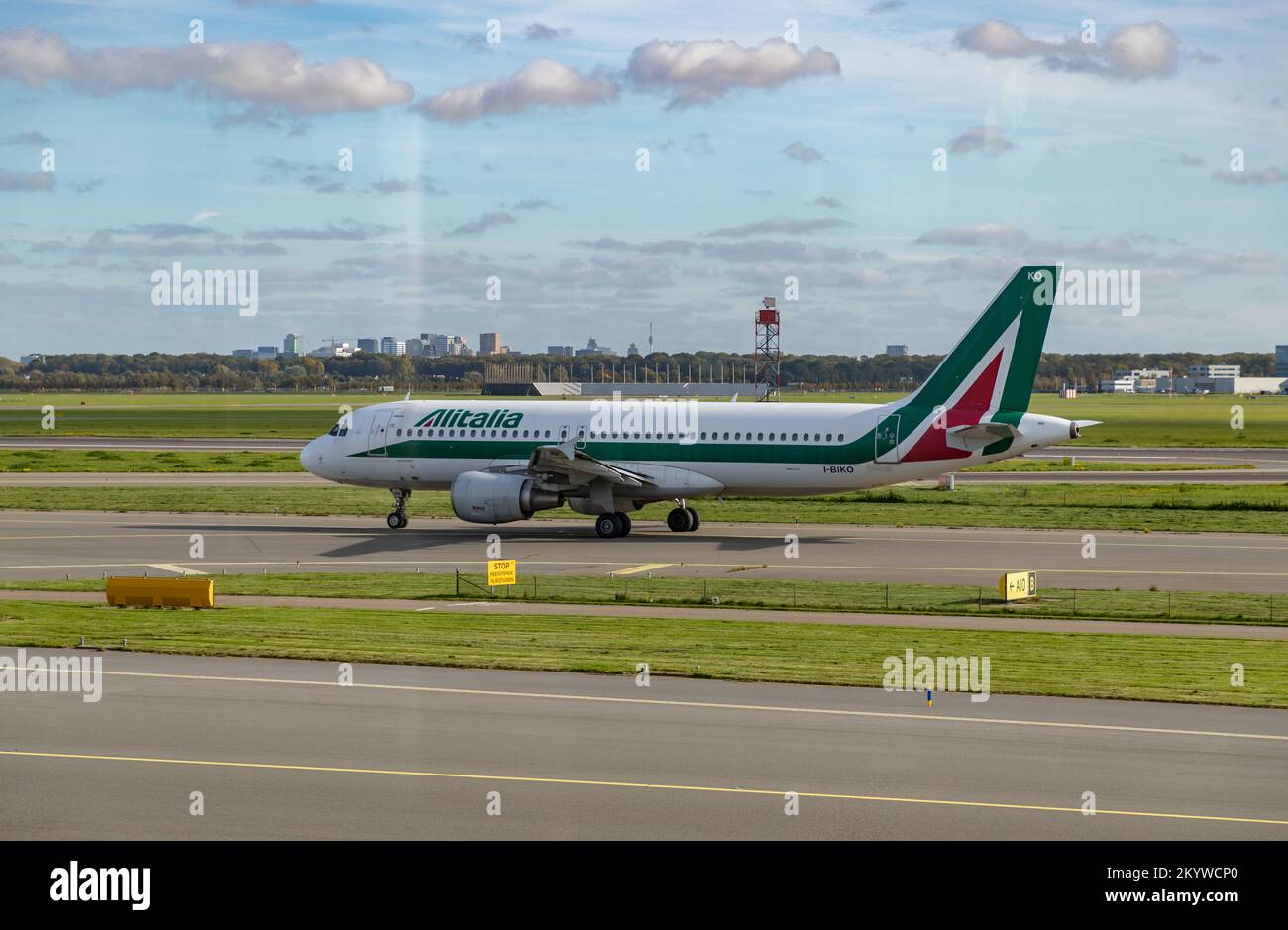 A picture of an Airbus A320 Alitalia plane on the runway Stock Photo ...