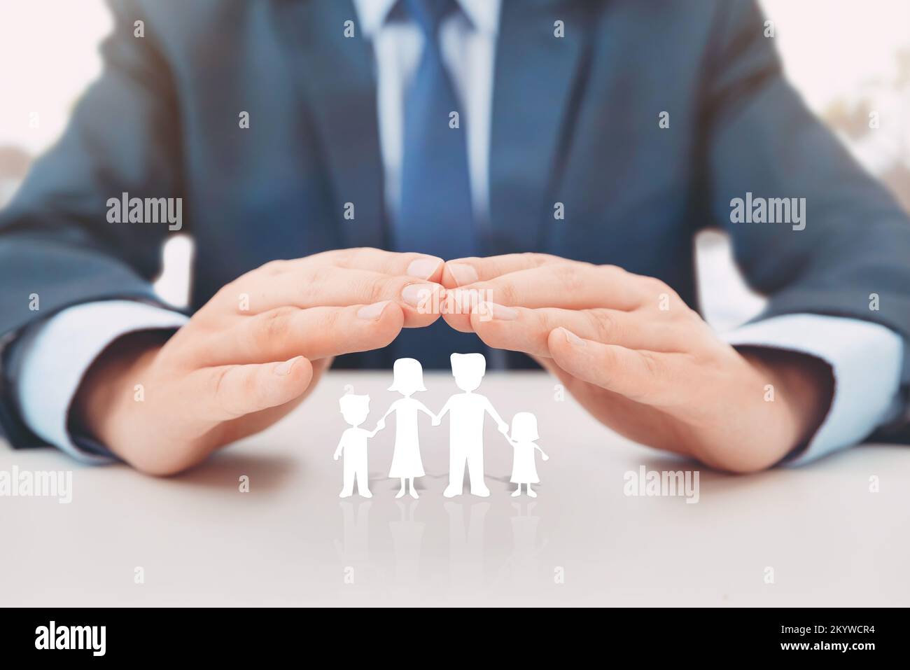 Family insurance, protection and safety concept. Insurance agent ...