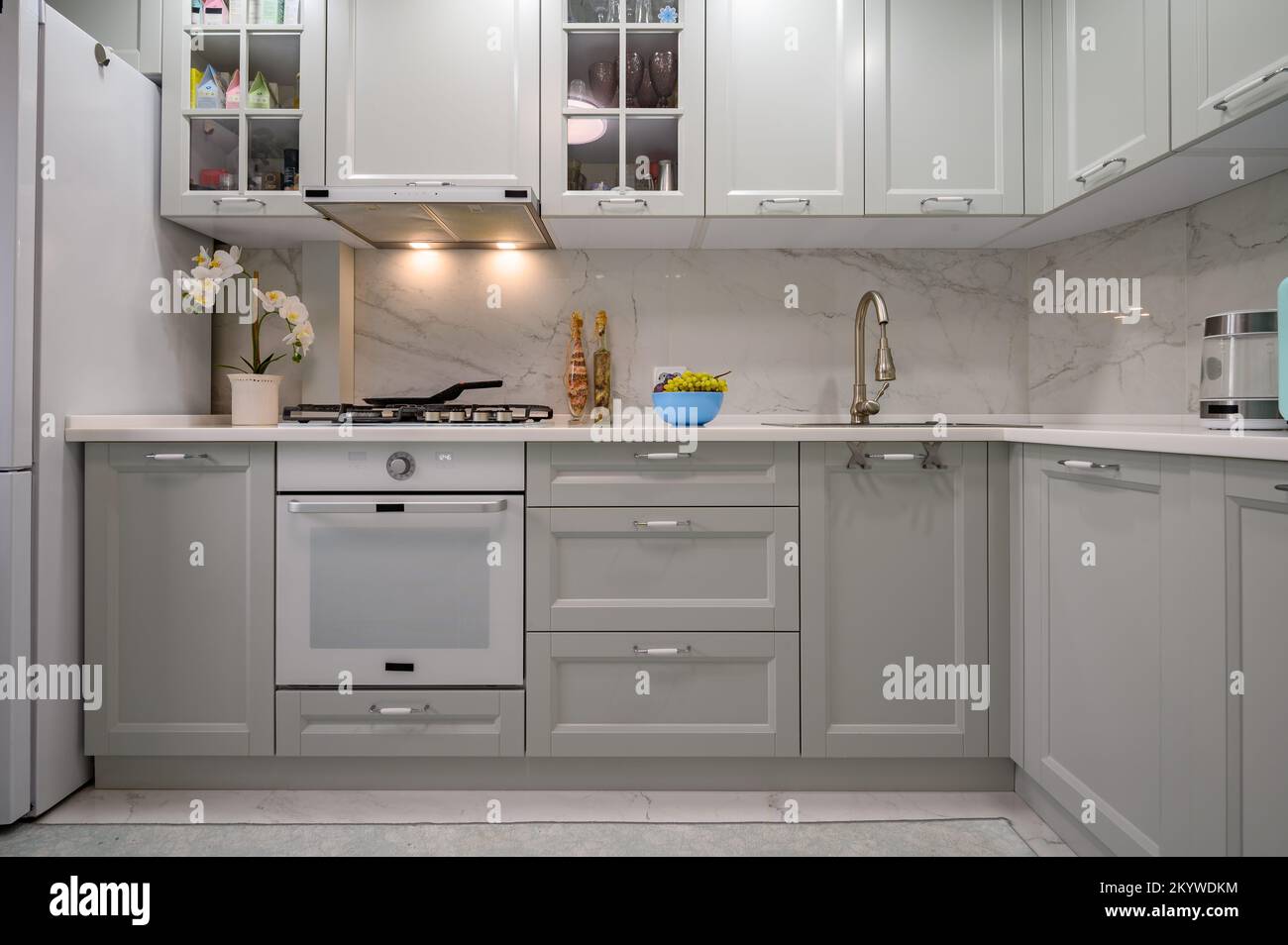 New light grey modern well designed kitchen interior, front view Stock ...